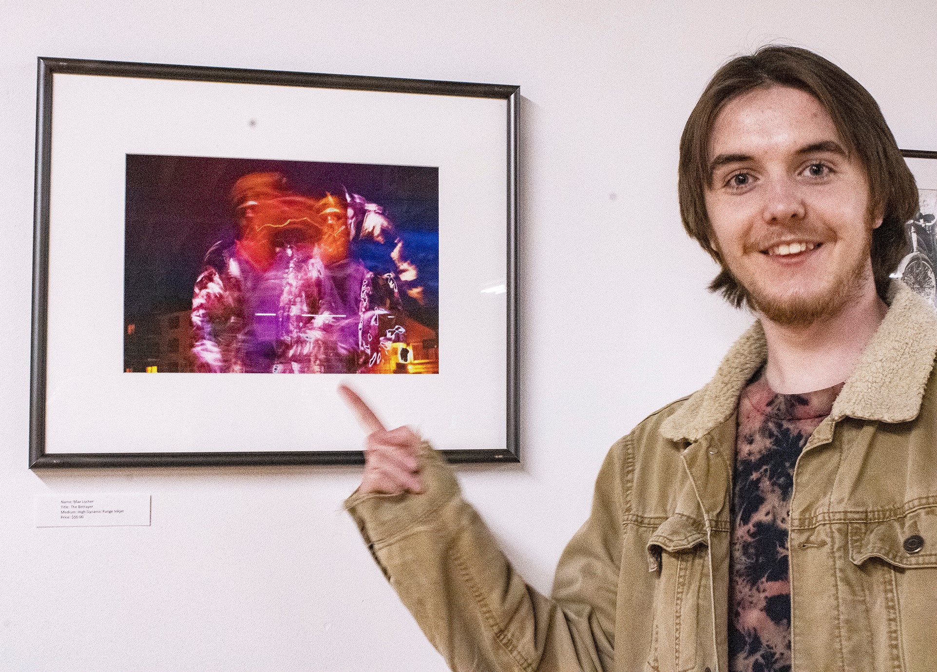 Max Locher, digital arts, stand with his digital composite photograph ...
